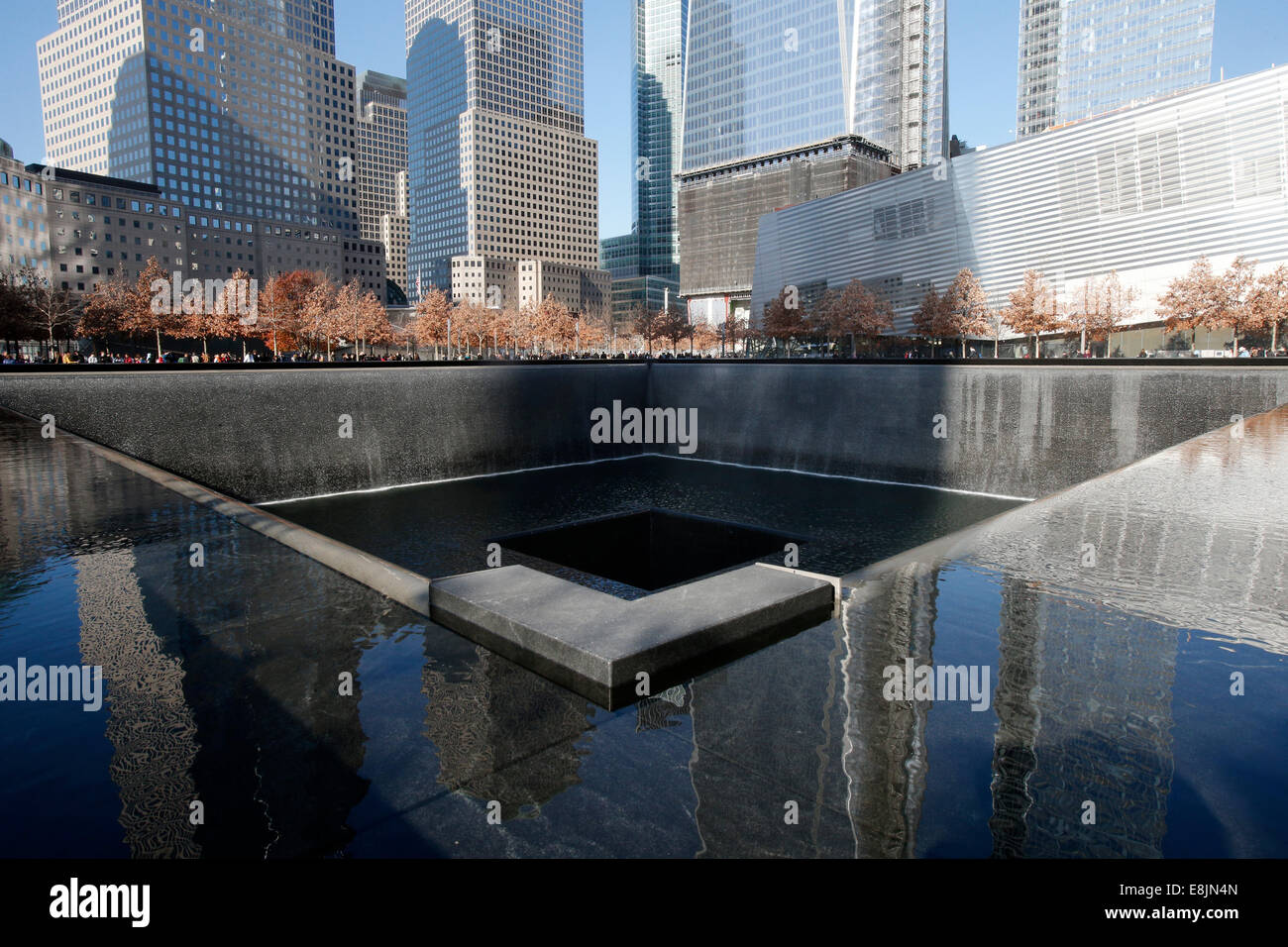 Ground zero. The National 9/11 Memorial at the site of the World Trade ...