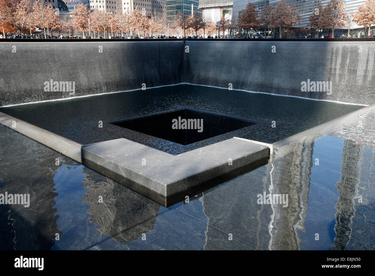 Ground zero. The National 9/11 Memorial at the site of the World Trade ...
