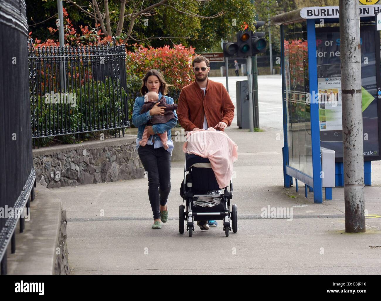 Fifty Shades of Grey actor Jamie Dornan takes a stroll with his wife ...