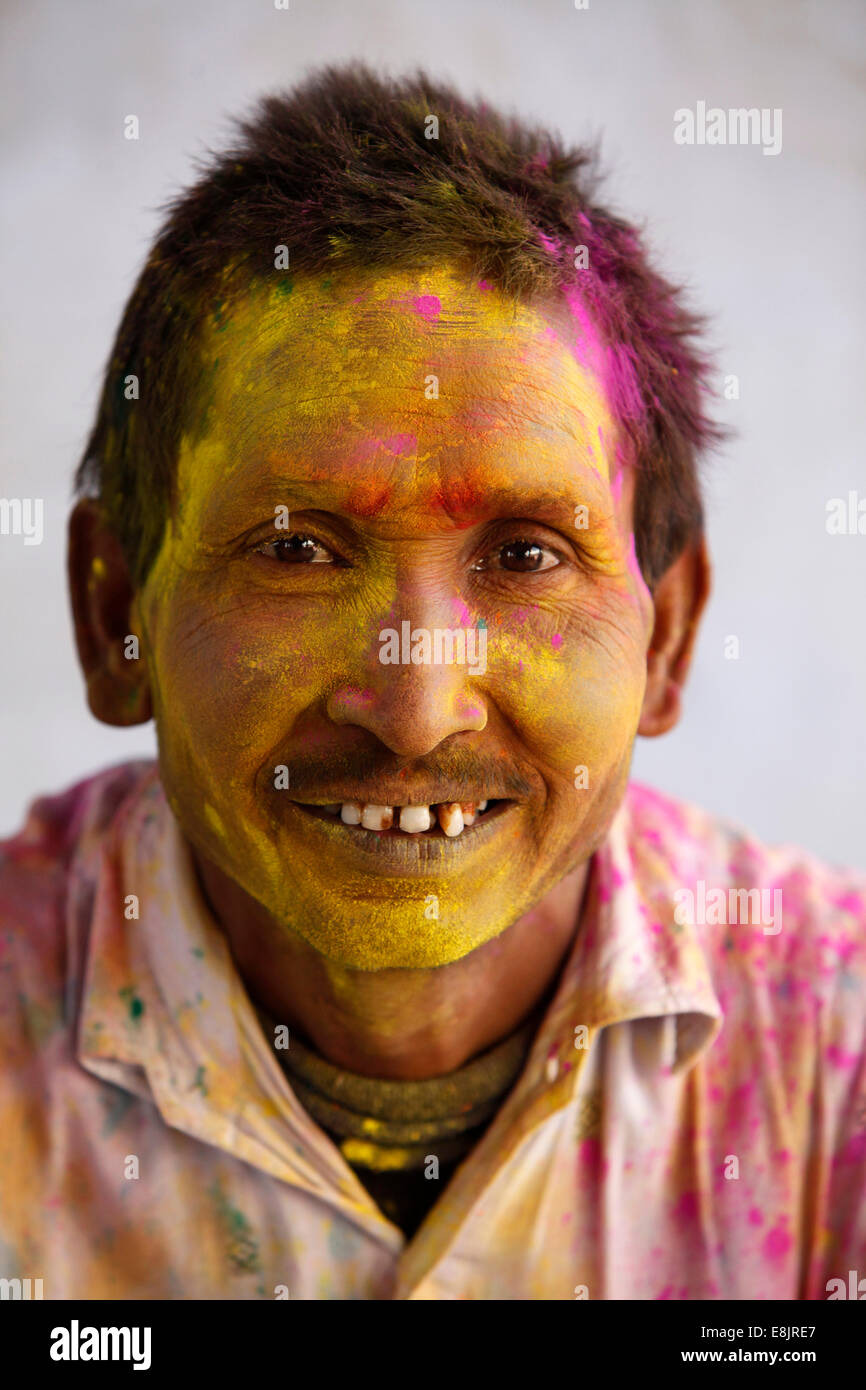 Man celebrating Holi festival Stock Photo - Alamy
