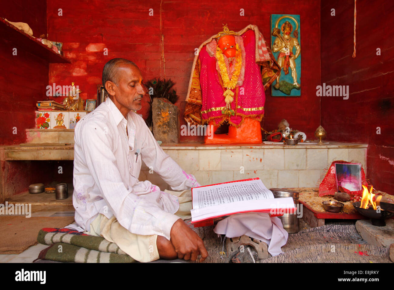 Hindu priest reading the Ramayana. The temple is located on the ...