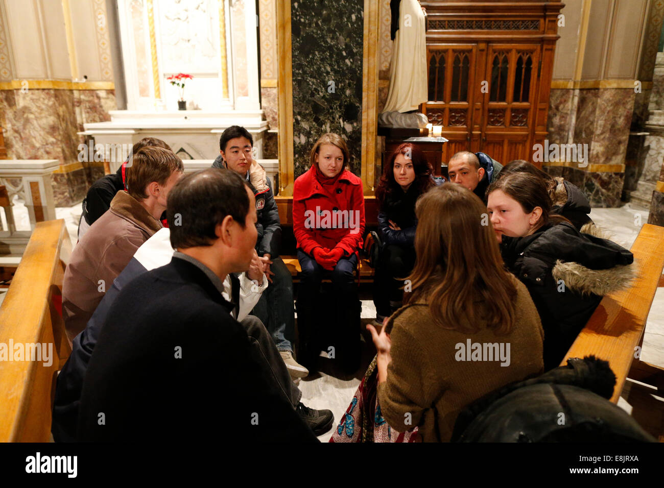 Small group meetings in a church. European Meeting of Taize Community ...
