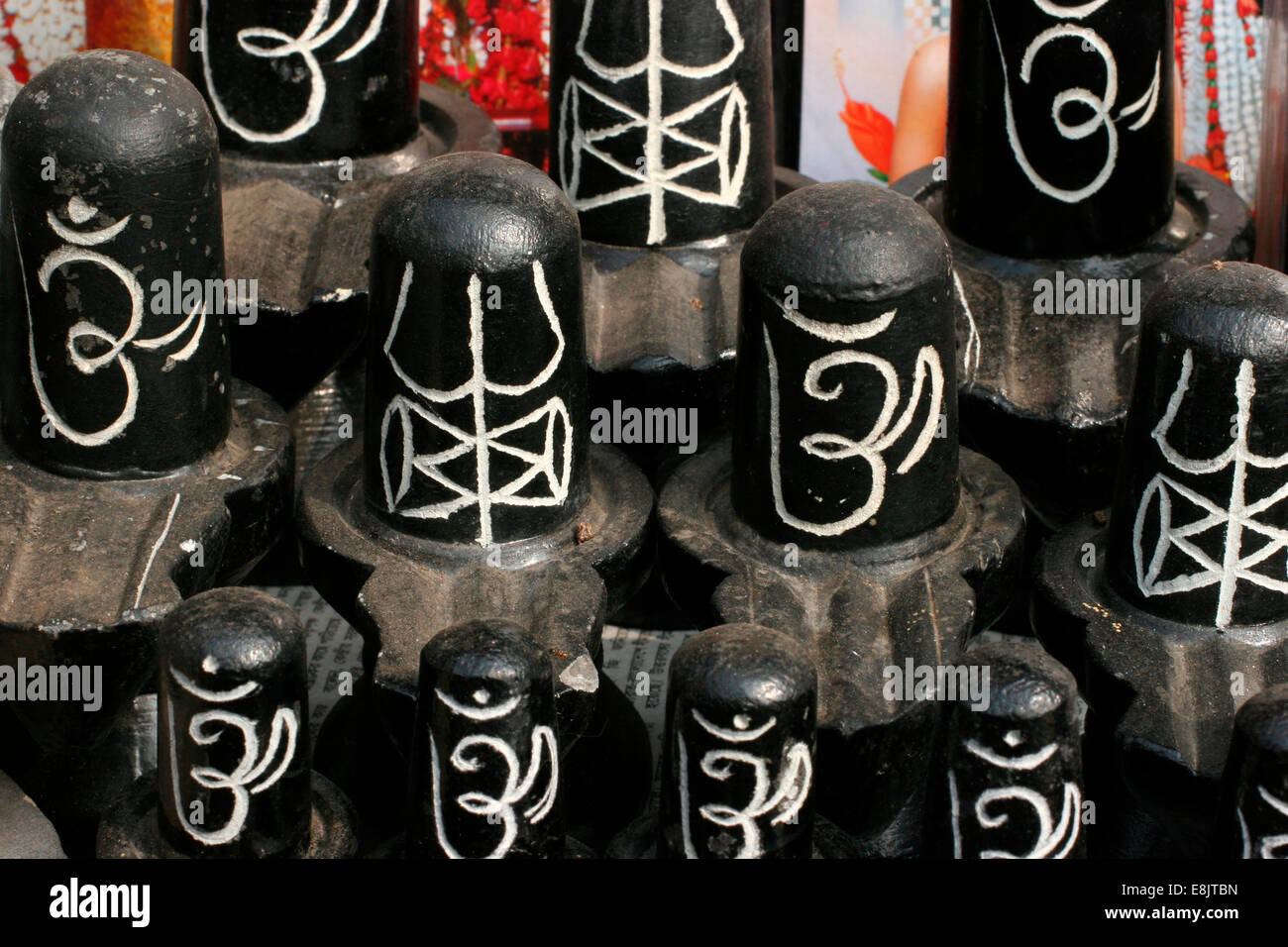 Small lingams sold near a Hindu temple Stock Photo - Alamy