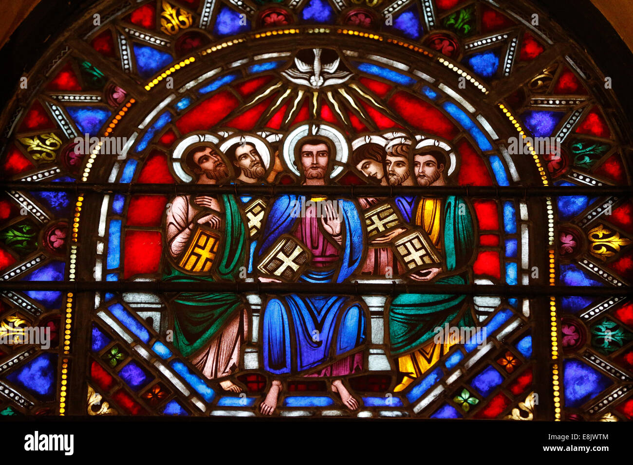 St Barth's church. Stained glass window. Jesus and the 12 apostles ...