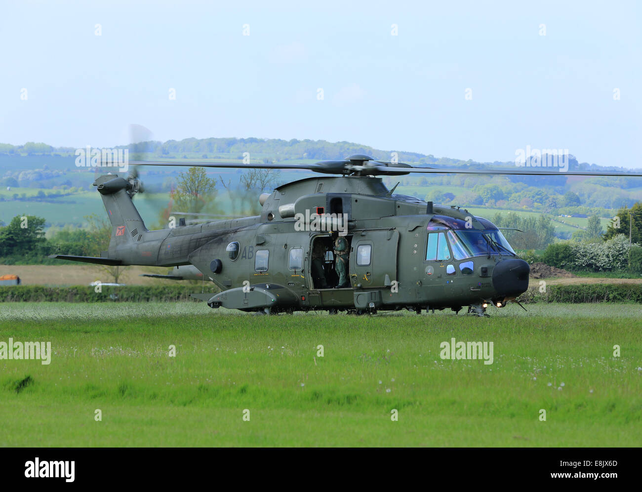 An RAF Merlin helicopter about to lift off on exercise from the farm ...