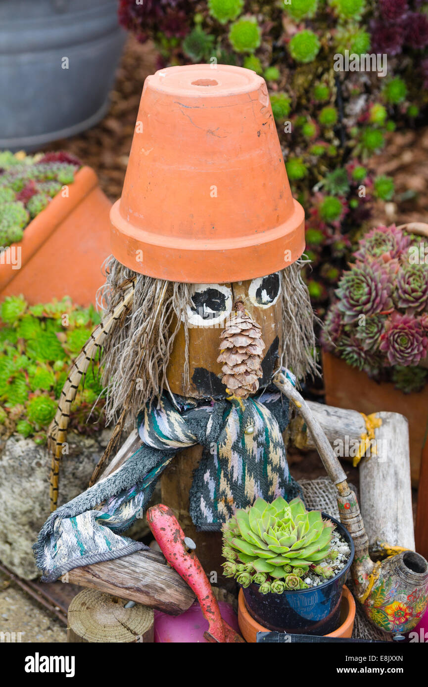 Pot man with a pipe Stock Photo - Alamy