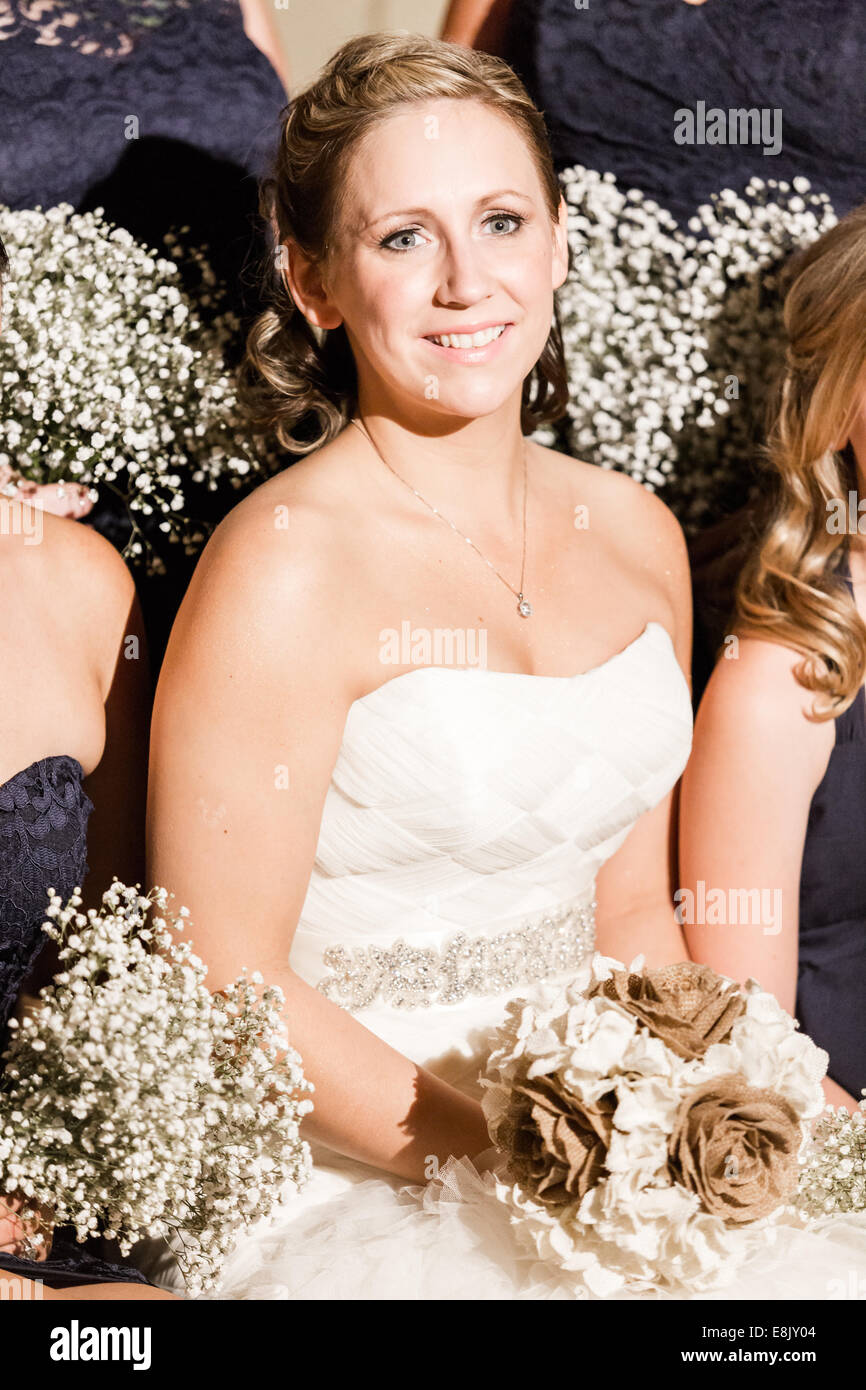 Bride posing for formal picture with bride maids before ceremony Stock ...