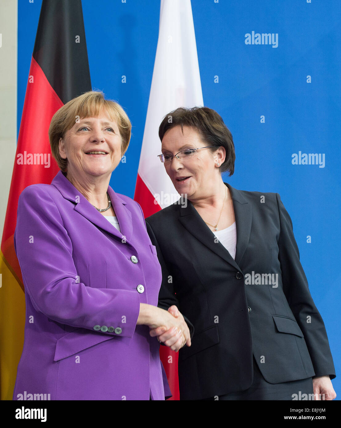 Berlin, Germany. 9th Oct, 2014. German Chancellor Angela Merkel (L) and ...