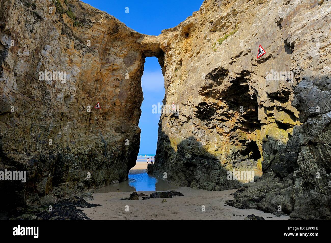 A view through a rock archway at Droskyn point Perranporth Cornwall ...