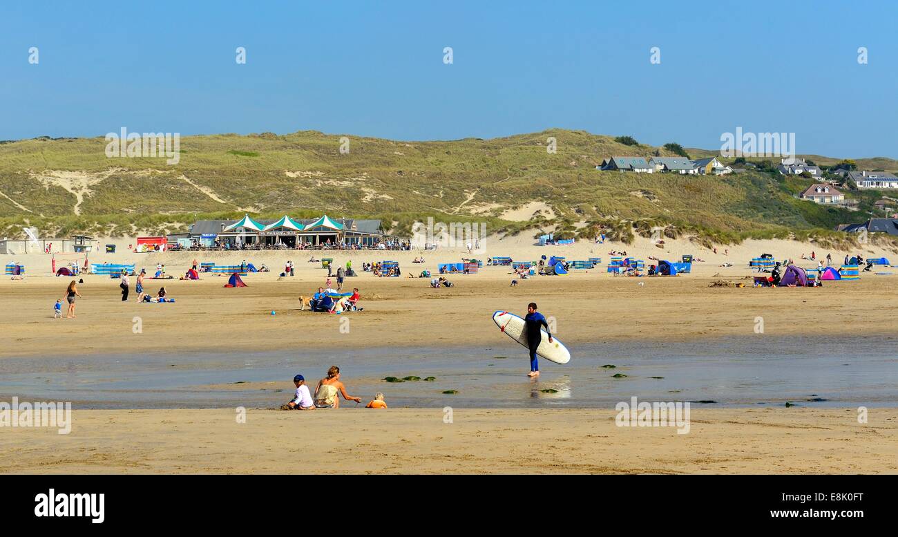 A man carry a surf board on Perranporth Beach Cornwall England uk Stock ...