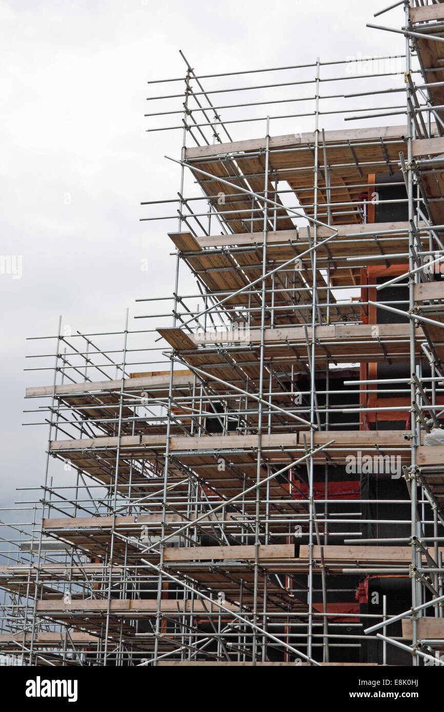 Extensive scaffolding provides the platforms for work in progress on a ...