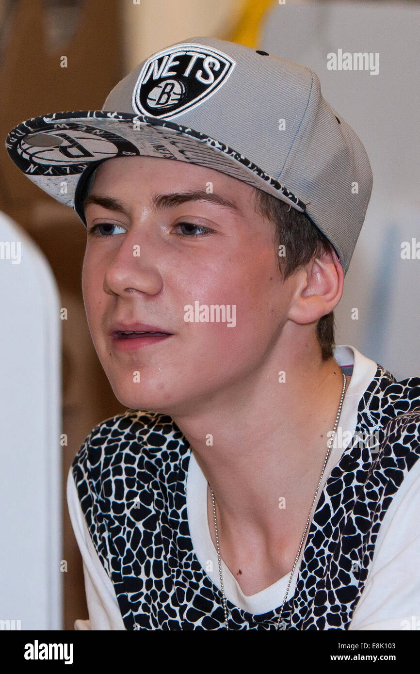 Swedish boyband The Fooo sign copies of their new album entitled 'Off ...