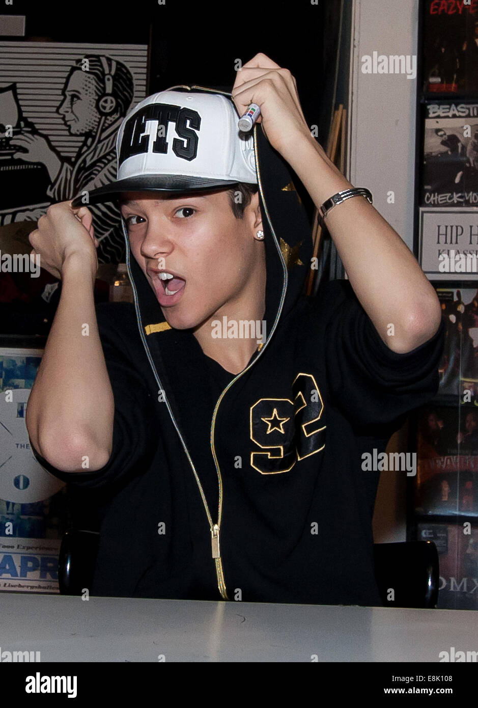 Swedish boyband The Fooo sign copies of their new album entitled 'Off ...