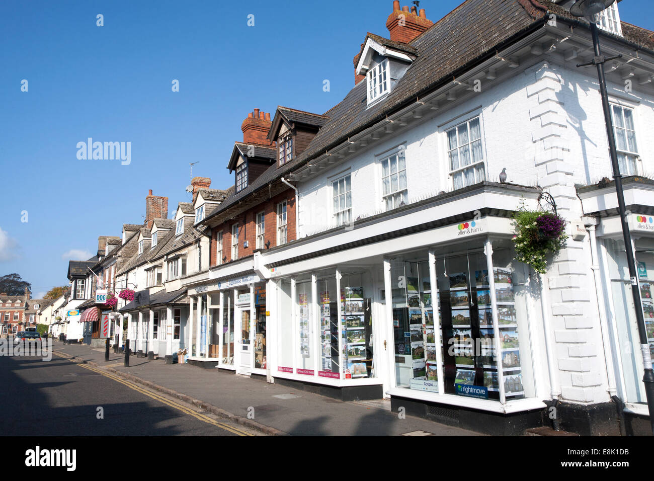 Row of shops in historic buildings in Highworth, Wiltshire, England, UK ...