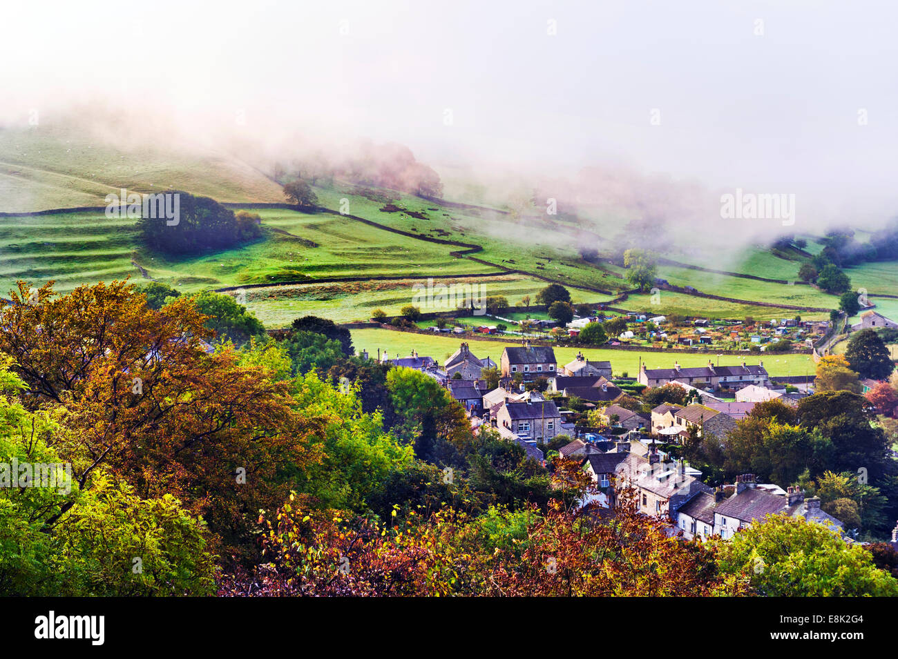 Misty Autumn morning, with low cloud, over the town of Settle, North ...