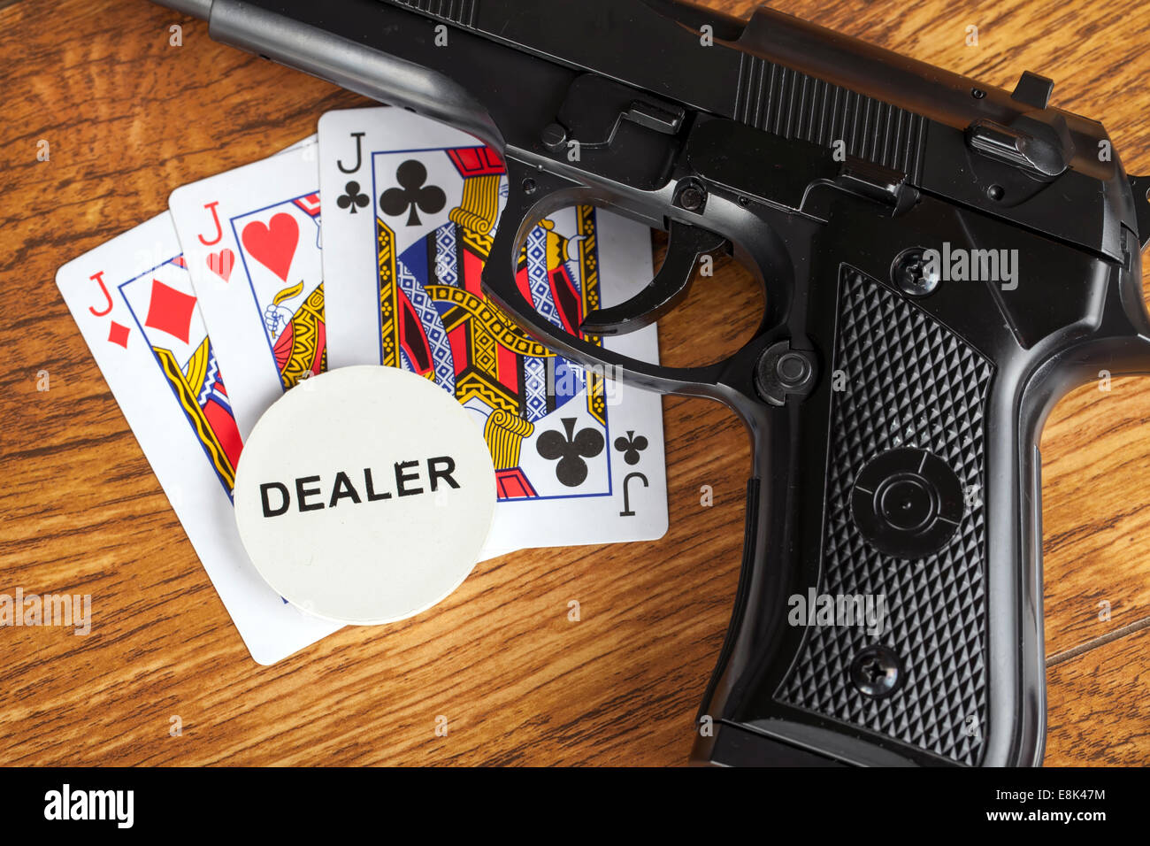 Hand holding gun dealer hi-res stock photography and images - Alamy