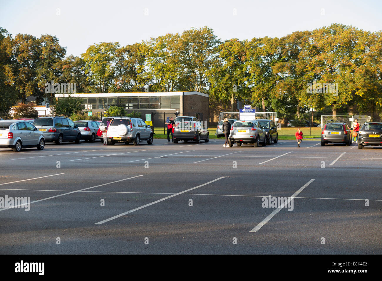 School car park during term time / cars parking in the morning drop off ...