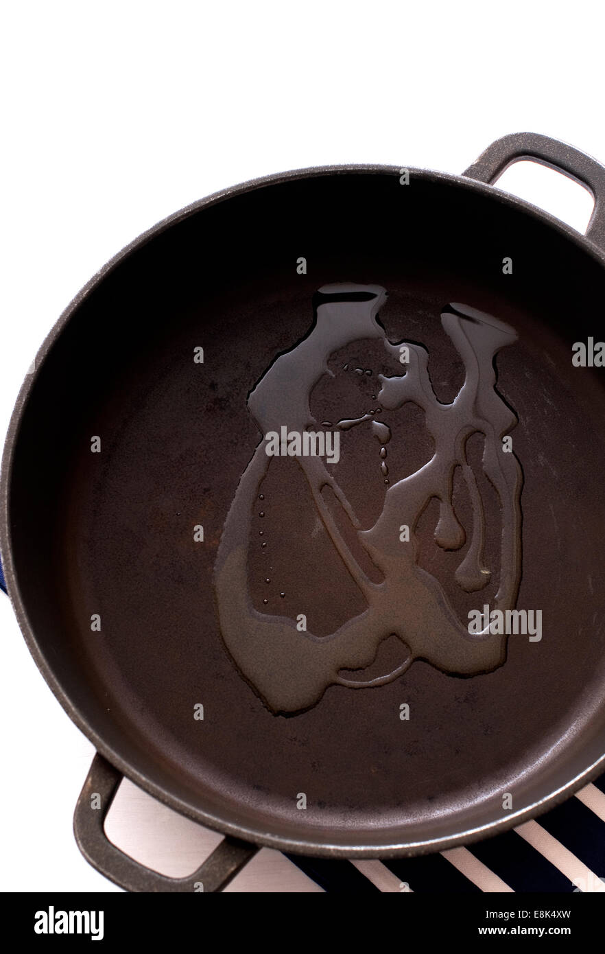 Still life food image of a cooking untensil - Pan with Olive oil Stock ...