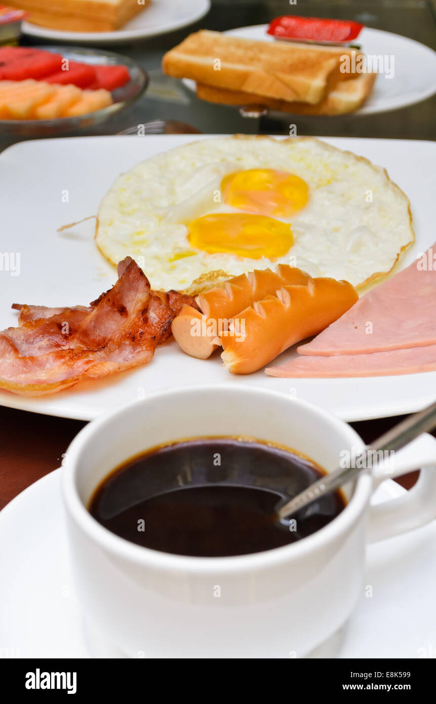 American breakfast, Coffee, Fried egg, Sausage, Ham, Bacon Stock Photo ...