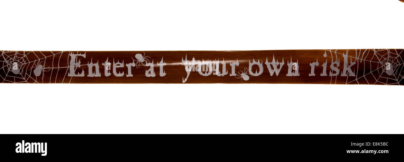 Enter at your own risk banner cutout Stock Photo - Alamy