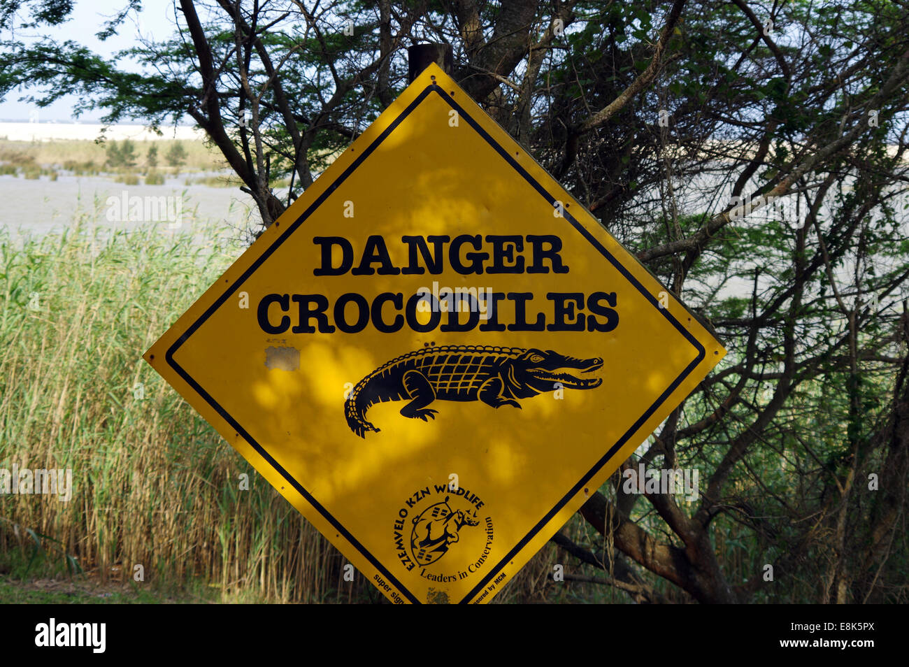 Sign at the Estuary Beach in iSimangaliso Wetland Park, South Africa ...
