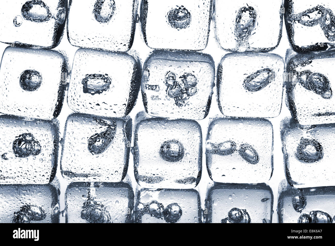 Melting ice cubes with air bubbles inside on white background Stock ...