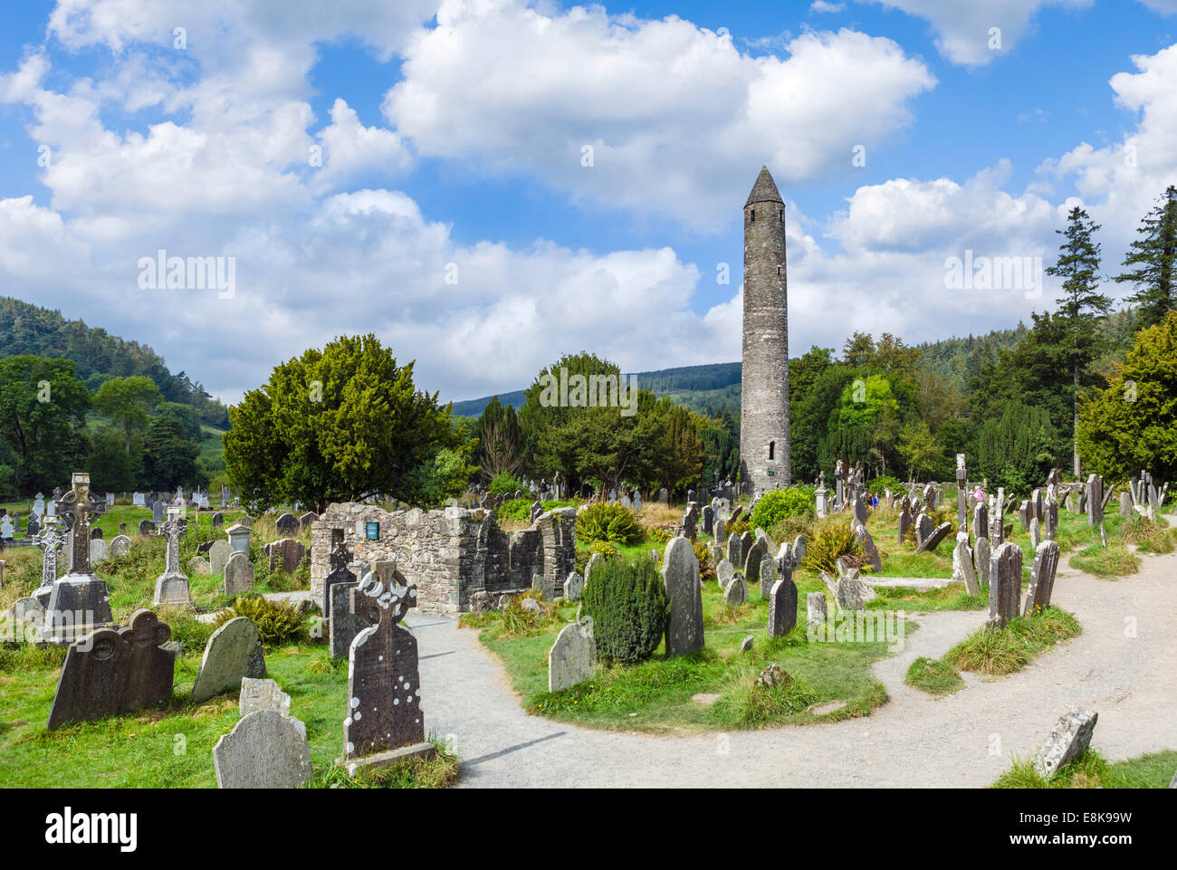 Cemetery and Round Tower in the old monastic settlement of Glendalough ...