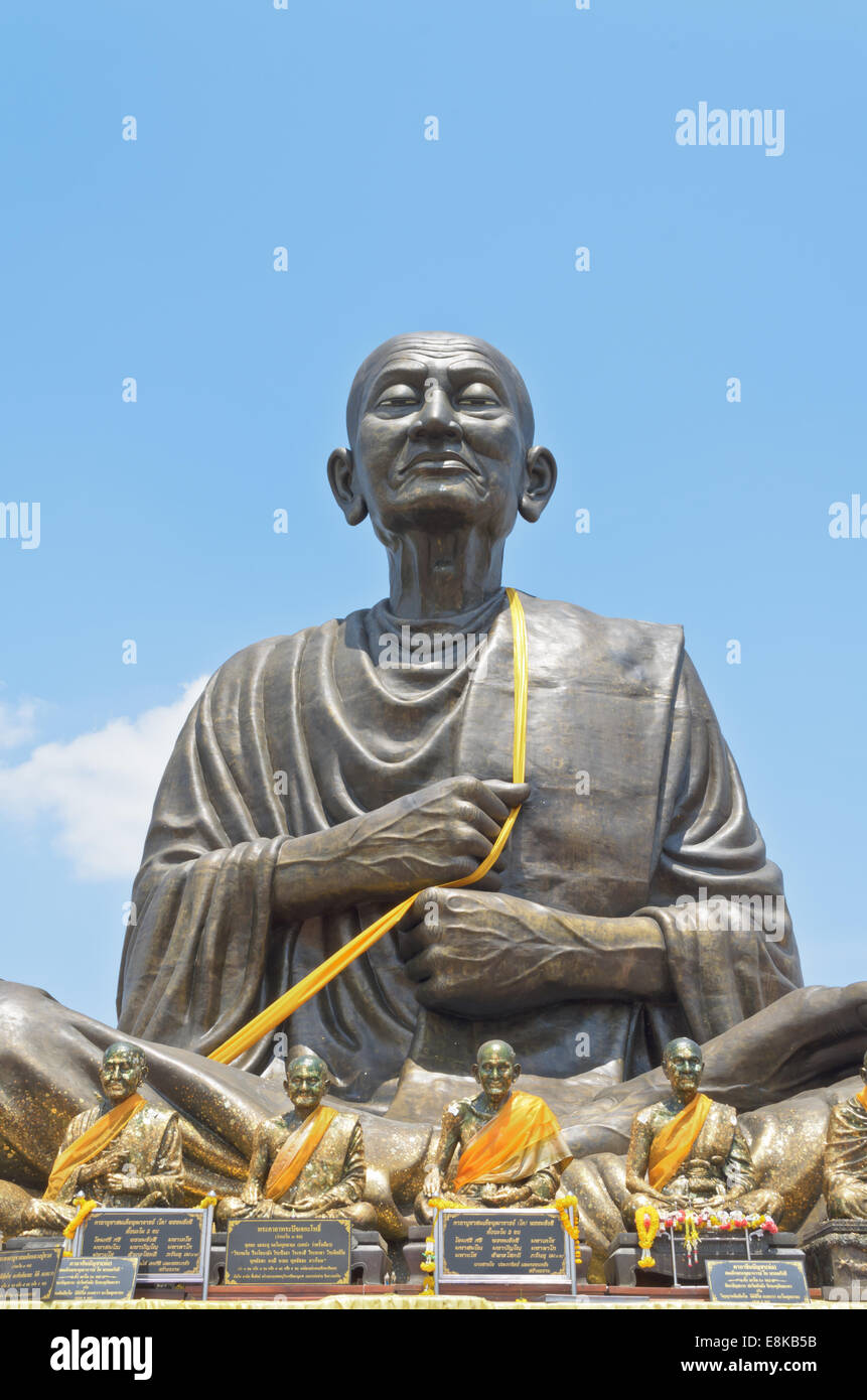 Large black statue of Luang Pho To monks in the public areas of the Tan ...