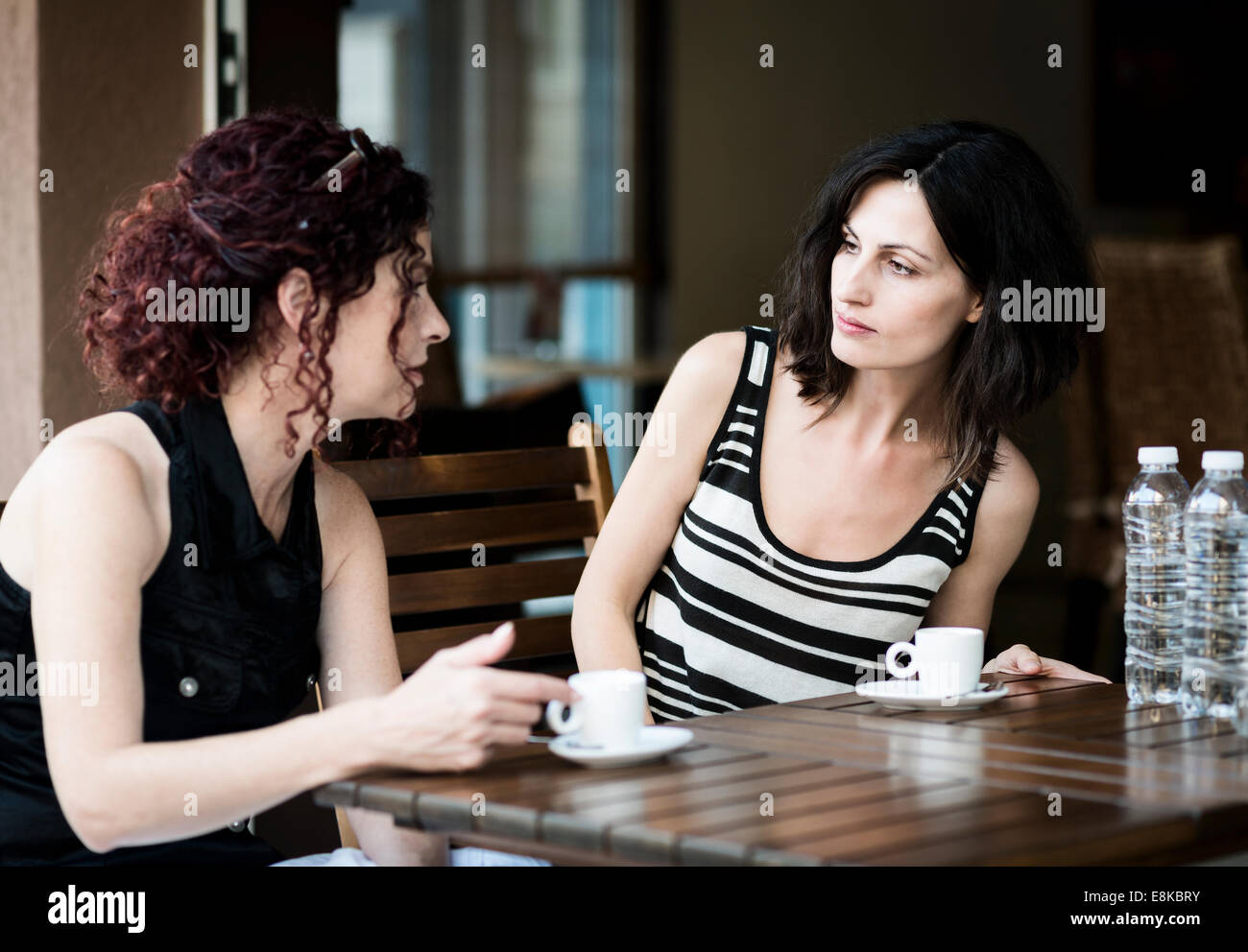 Women chatting coffee hi-res stock photography and images - Alamy