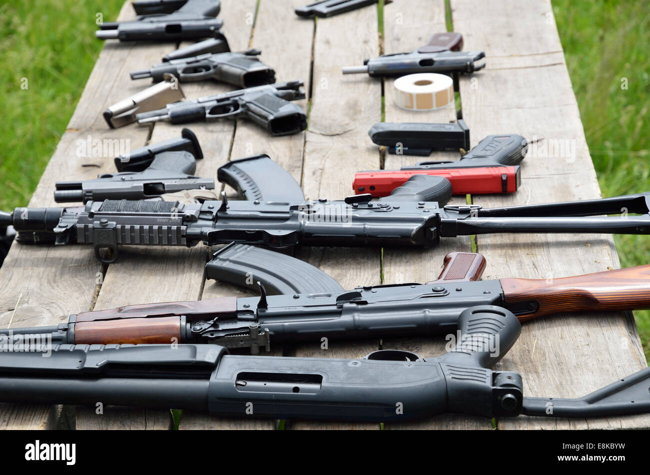 Portable guns on the table Stock Photo - Alamy