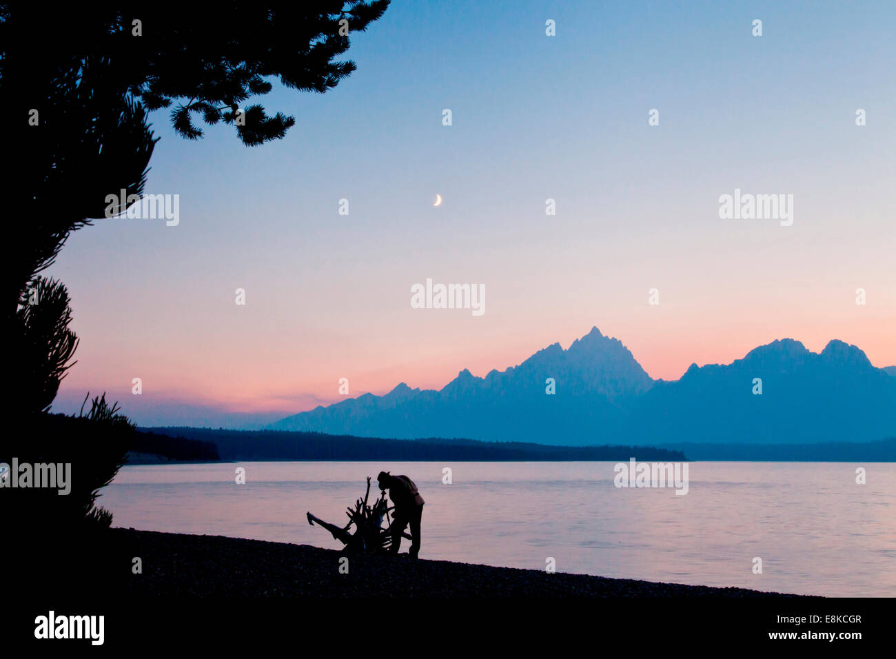 Crescent moon over Jackson Lake and Grand Teton range Stock Photo - Alamy