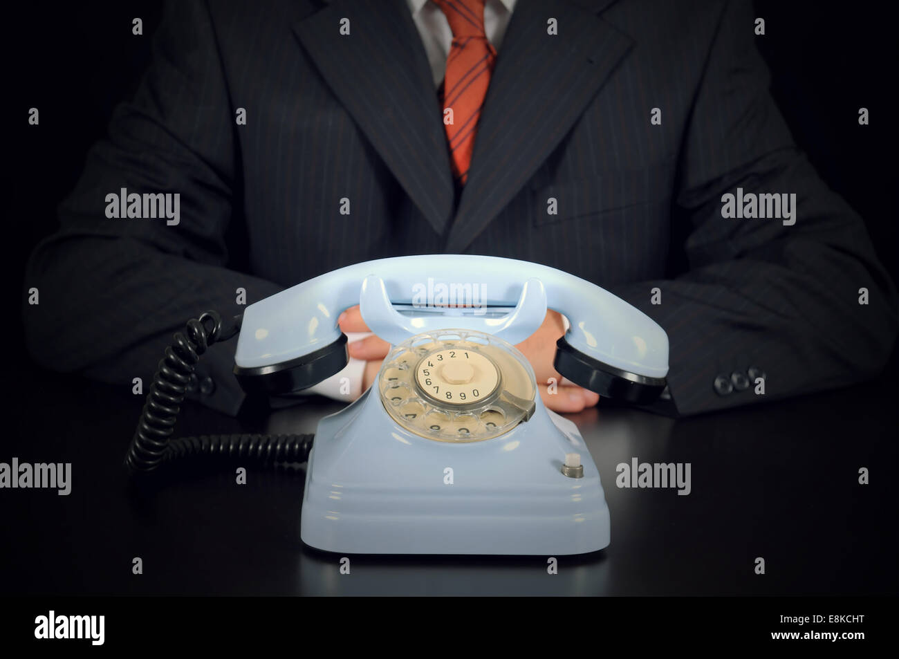 Businessman is waiting for Important call on the black background Stock ...