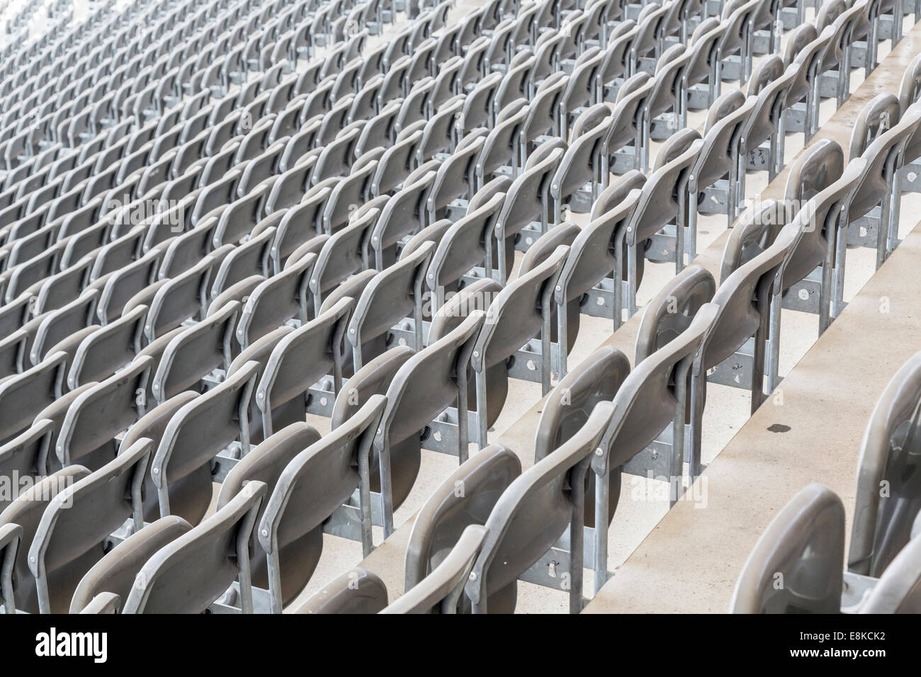 some rows of gray stadium seats, shoot from behind Stock Photo - Alamy