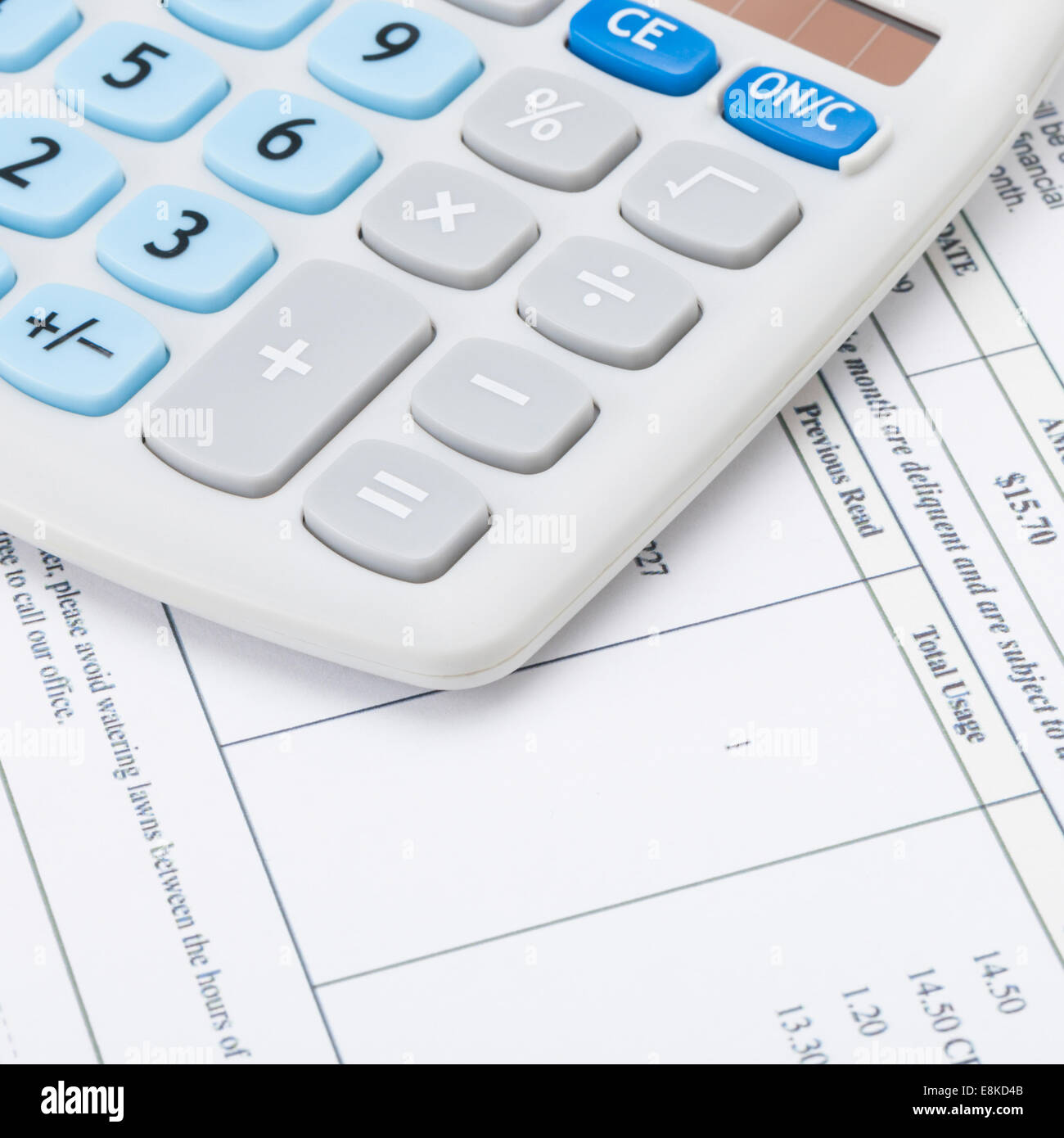 Studio shot of receipt and calculator - 1 to 1 ratio Stock Photo - Alamy