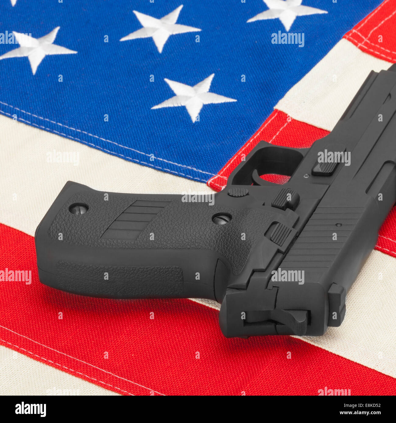Handgun over USA flag - studio shoot - 1 to 1 ratio Stock Photo - Alamy