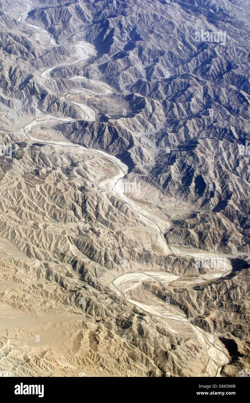 Aerial view of multi coloured rock formations in a barren Turkmenistan ...