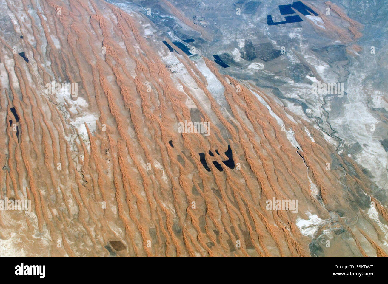 Aerial view of multi coloured rock formations in a barren Turkmenistan ...