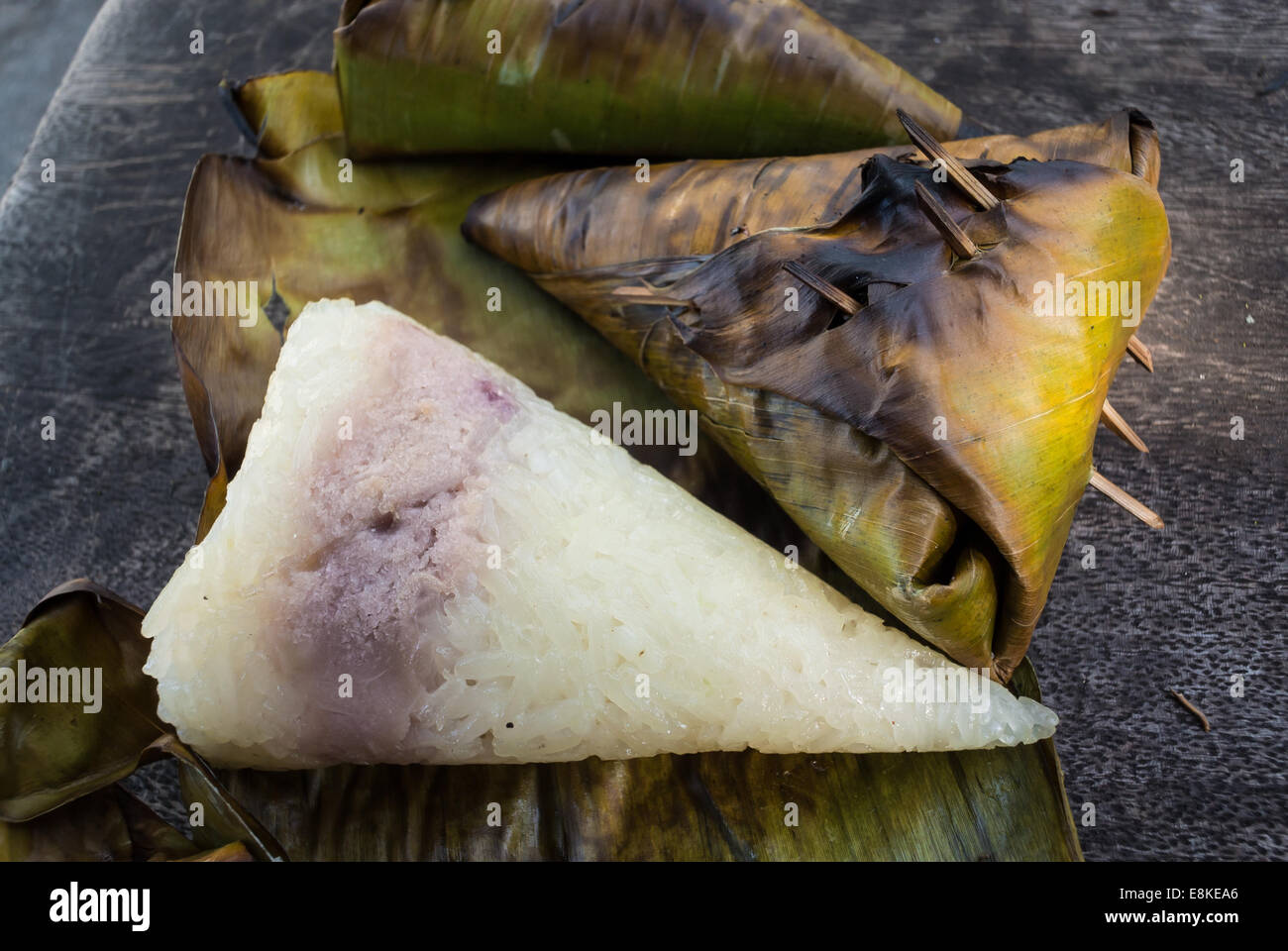 Sticky rice wrapped Stock Photo - Alamy