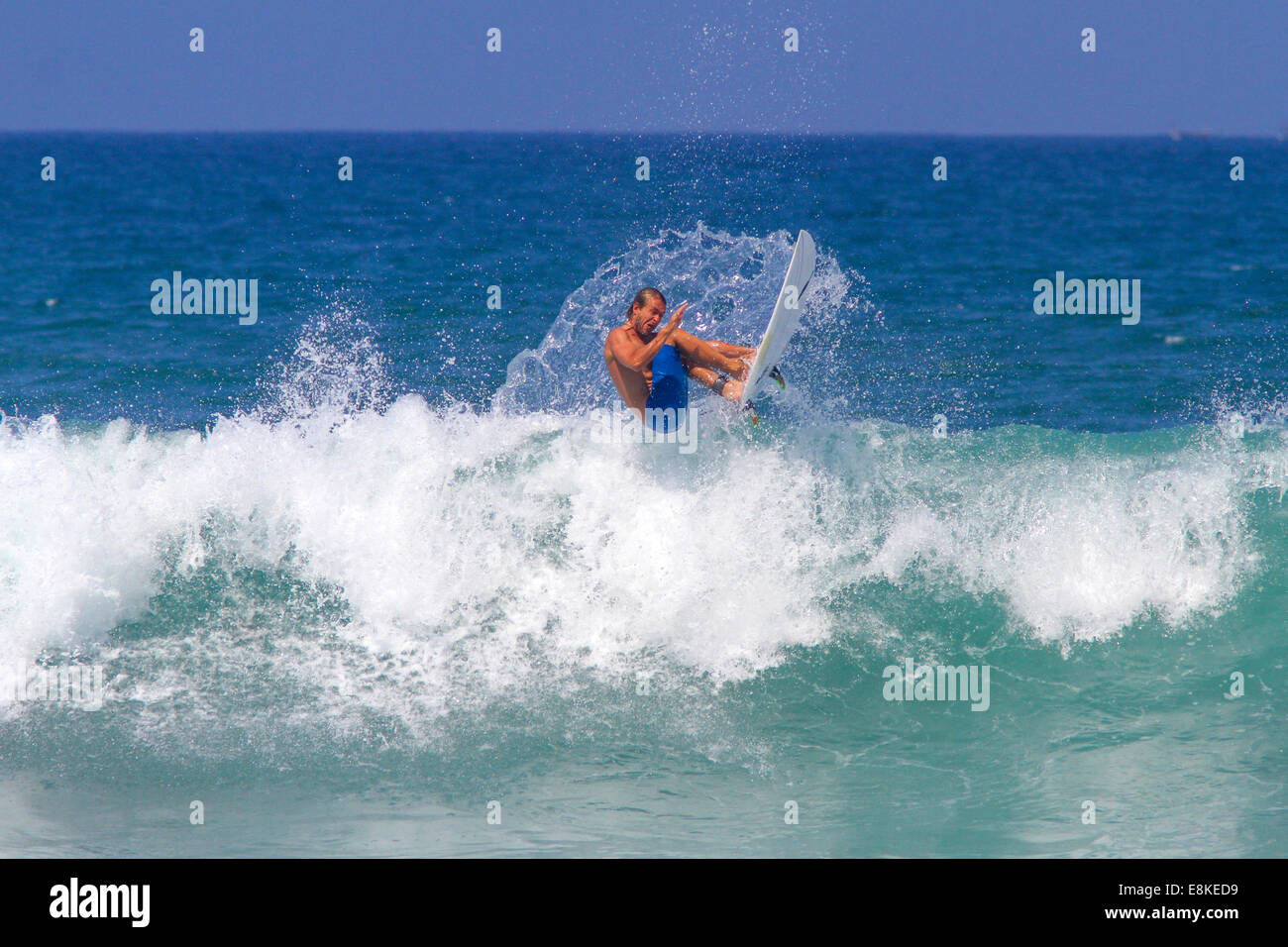 Surfing a wave.Indonesia Stock Photo - Alamy