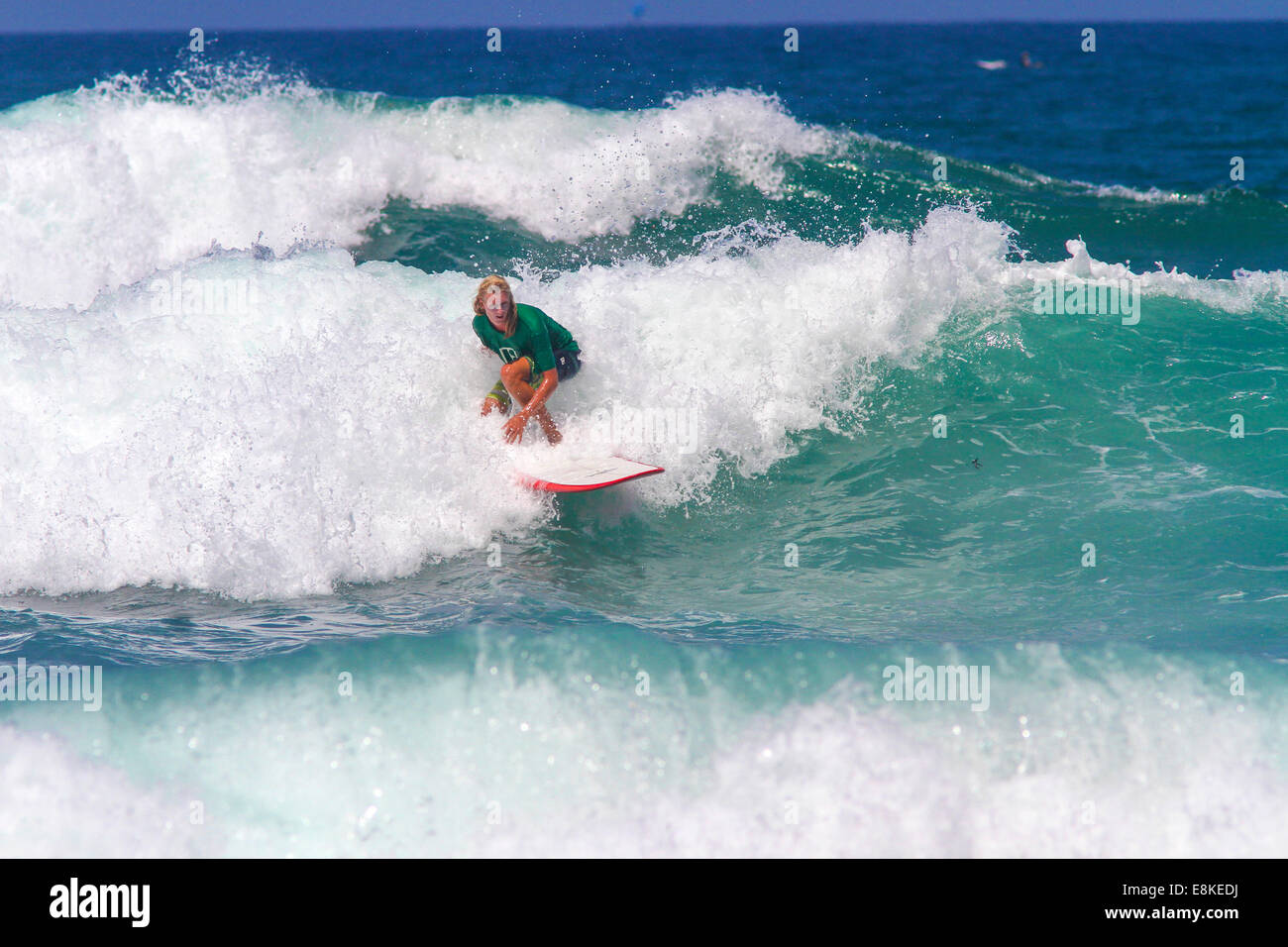 Surfing a wave.Indonesia Stock Photo - Alamy