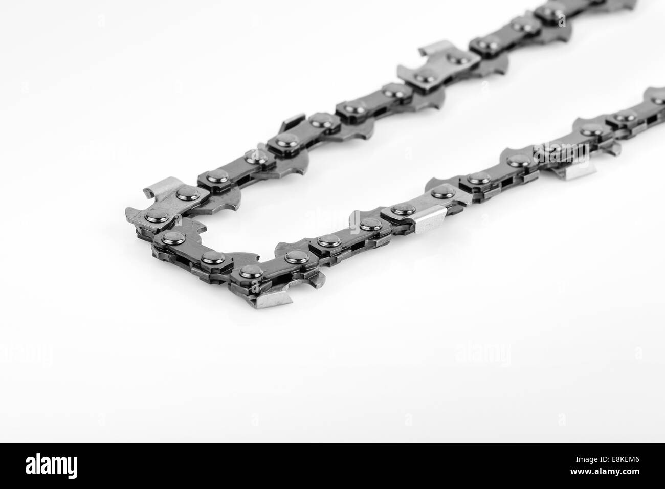 metal chain saw pattern background on white background Stock Photo - Alamy