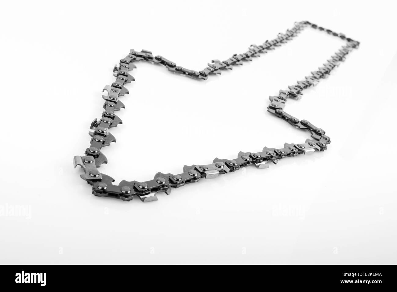 steel metal chain saw arrow shape pattern on white background as symbol ...