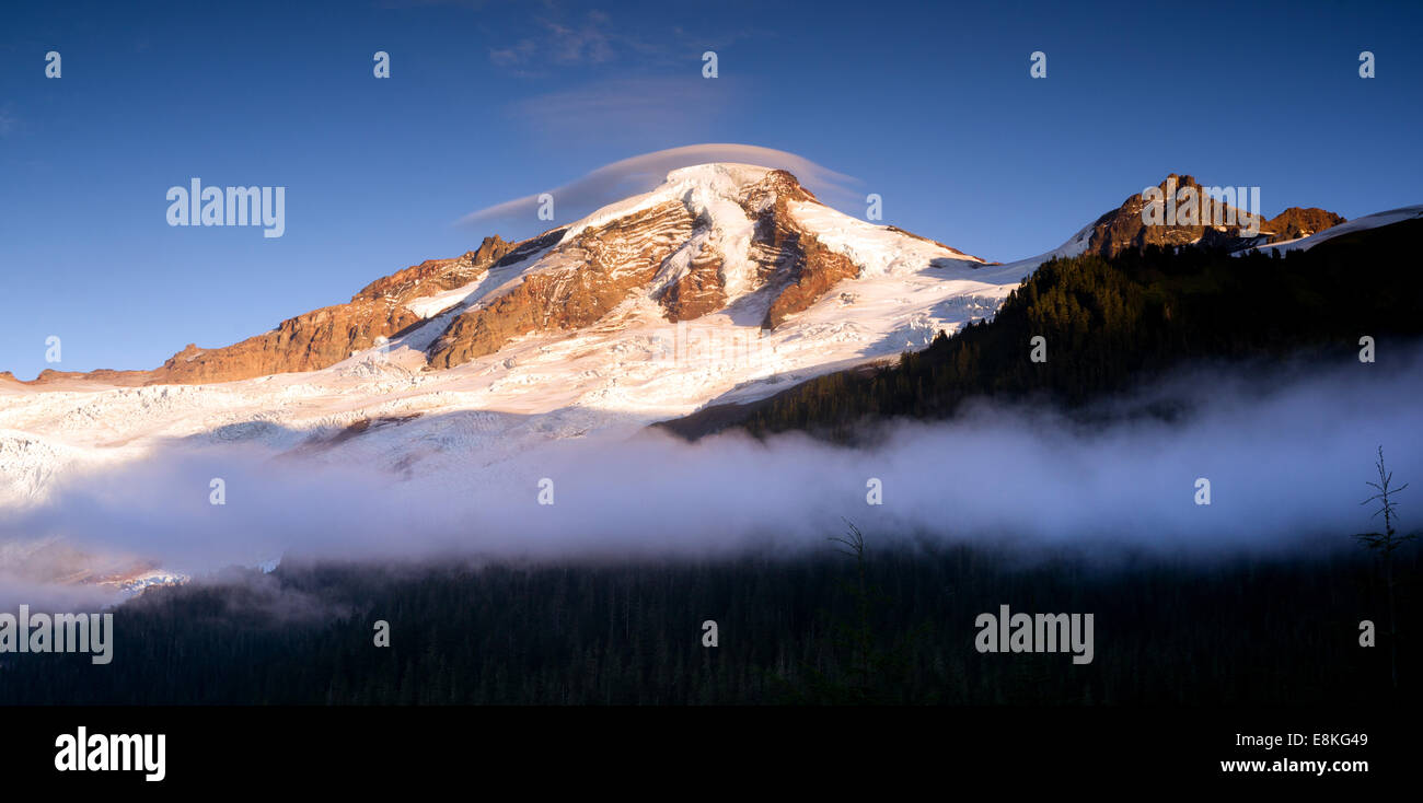 The sun is ready to set casting long shadows at Mt Baker Stock Photo ...