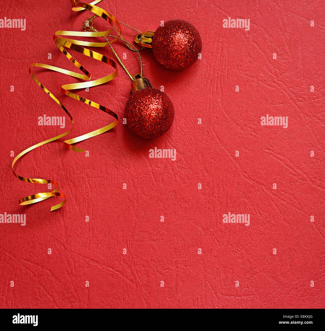 Red background with Christmas balls and streamer in a corner Stock ...