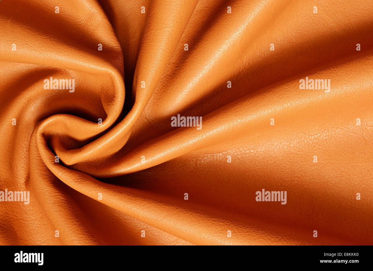 Tan color draped leather for background Stock Photo - Alamy