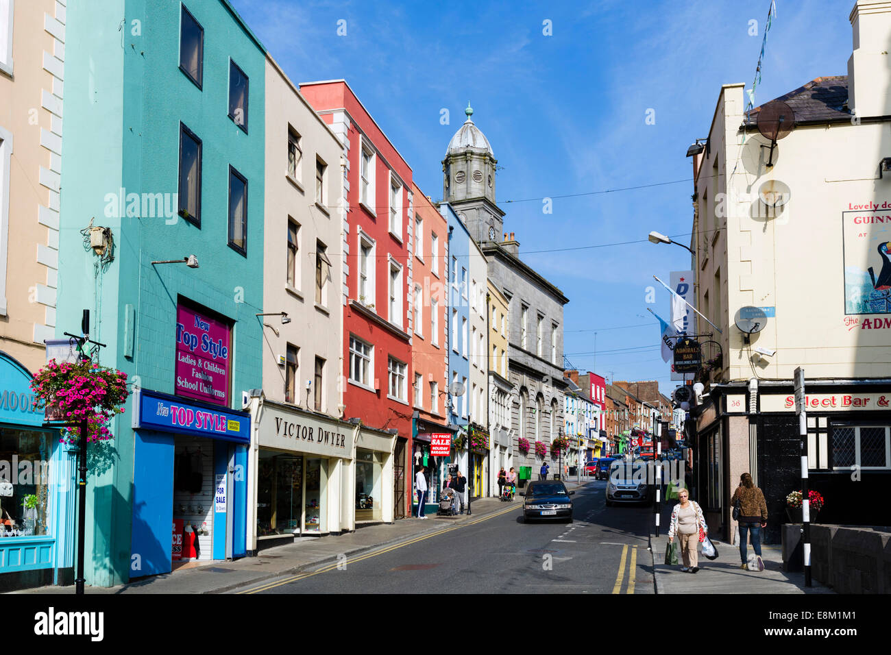 View down Shop Street with the tower of The Tholsel to the left ...