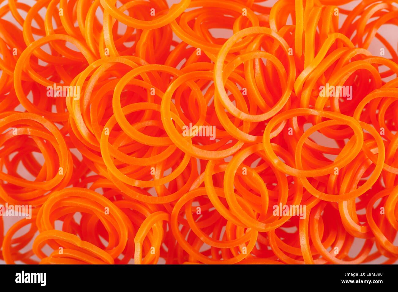 Bright orange Loom Bands. Detail. Close up Stock Photo - Alamy