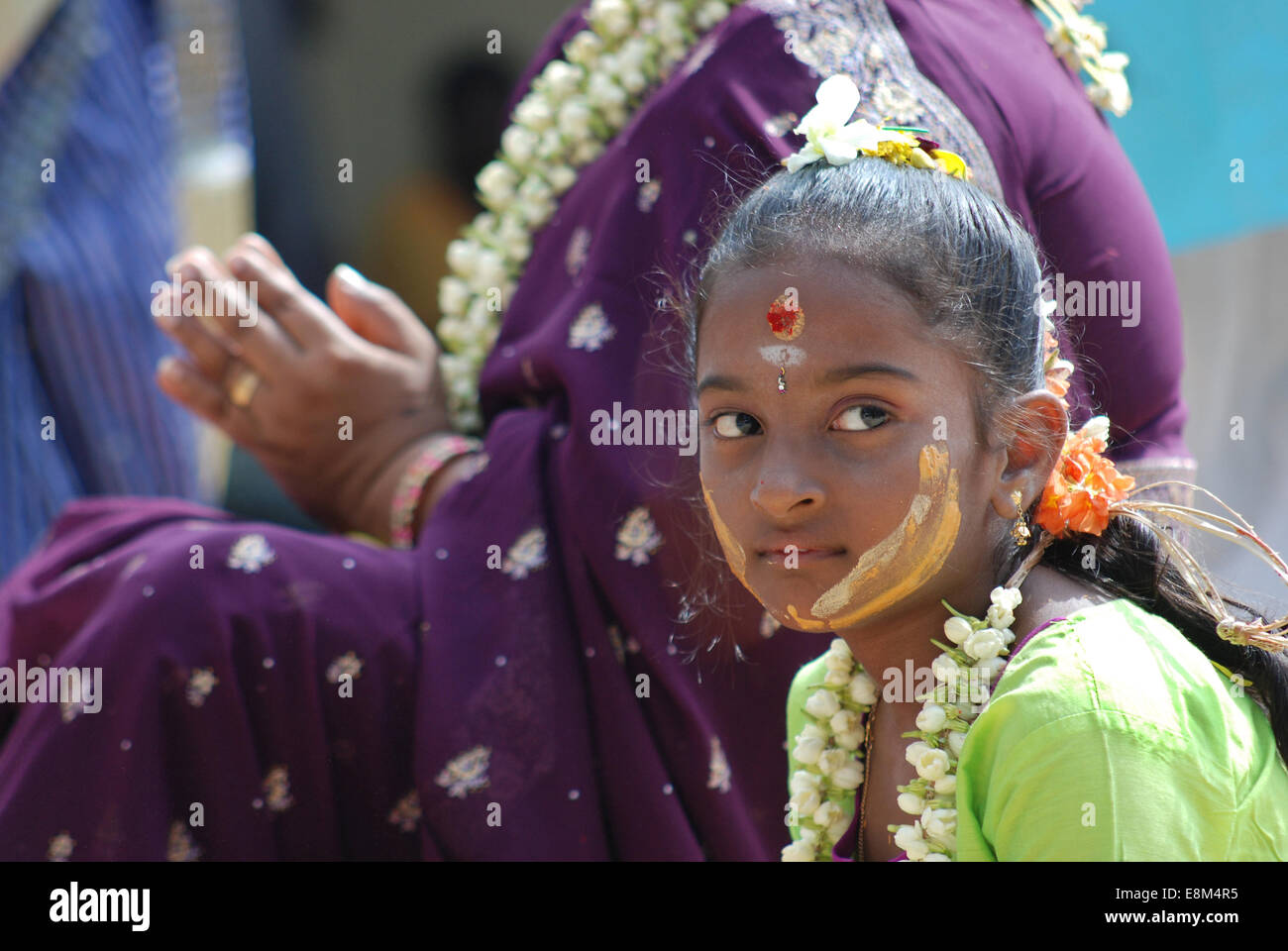 Young Indian girl with painted face in Hindu religious festival Stock ...