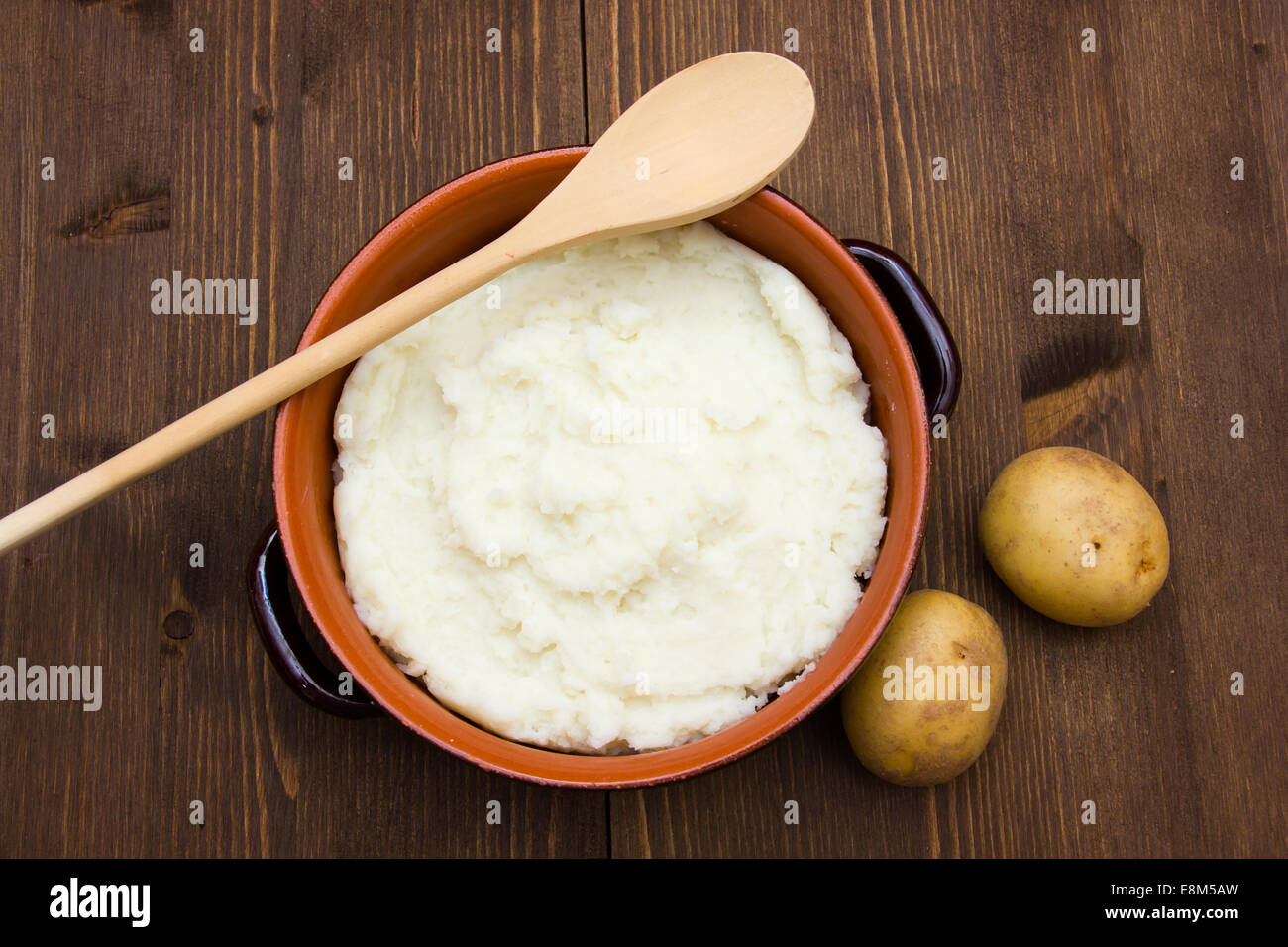 Mashed potato with spoon seen from above Stock Photo - Alamy