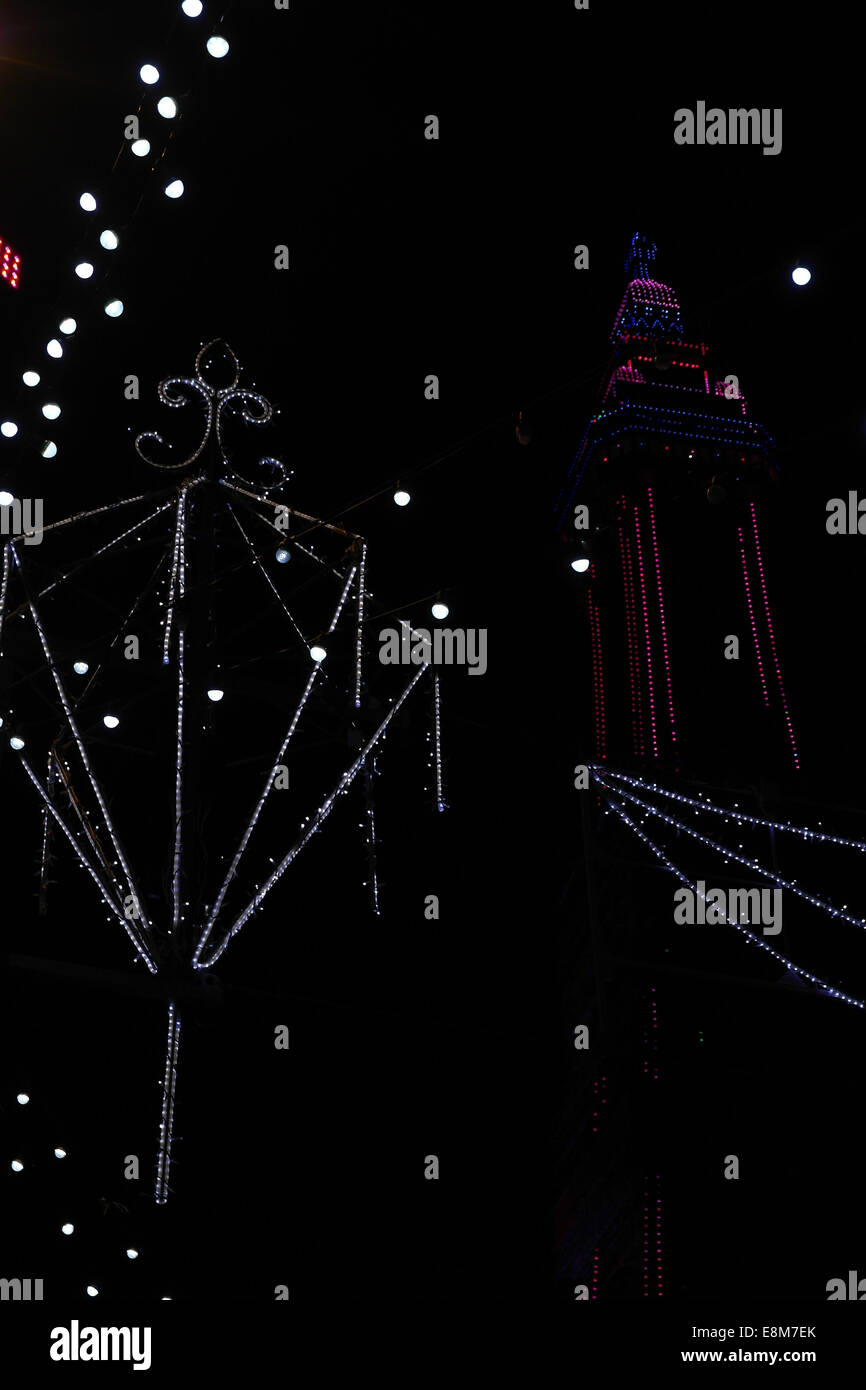 Night portrait red blue lights Blackpool Tower above blue LED diamond ...